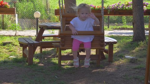 Little Girl Rocking Slow Motion Stock Footage Video (100% Royalty-free ...