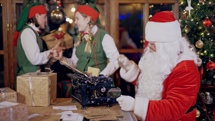 Christmas Elf Sitting on Presents image - Free stock photo - Public ...
