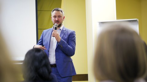 Experienced Speaker Talking Into Microphone Executive Stock Footage ...