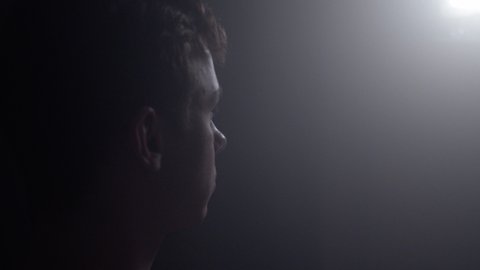 Young Guy Looking Into White Light Stock Footage Video (100% Royalty ...