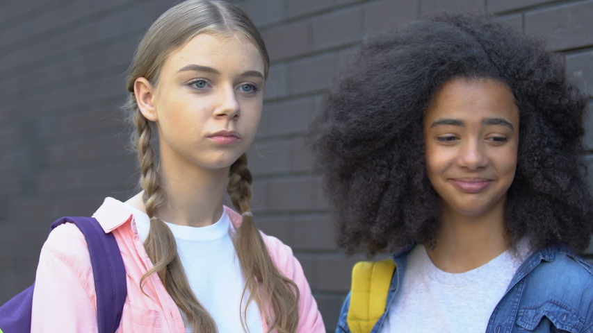 ashamed red-haired teenager passing by laughing Stock Footage Video ...