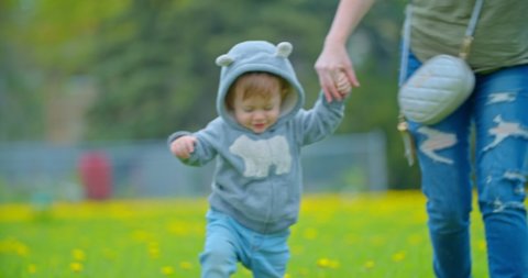 Little Boy Learns Walk Slow Motion Stock Footage Video (100% Royalty ...