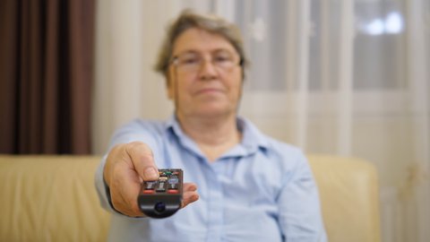 Old Woman Holding Remote Control Grandmother Stock Footage Video (100% ...