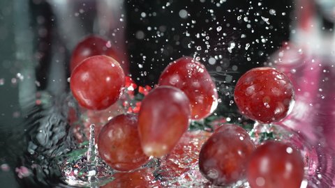 exploding cherry tomatoes water on black Stock Footage Video (100% ...