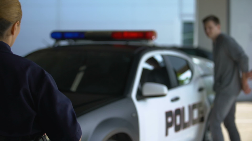 Police Officers Arresting Hooligan, Aiming Stock Footage Video (100% ...