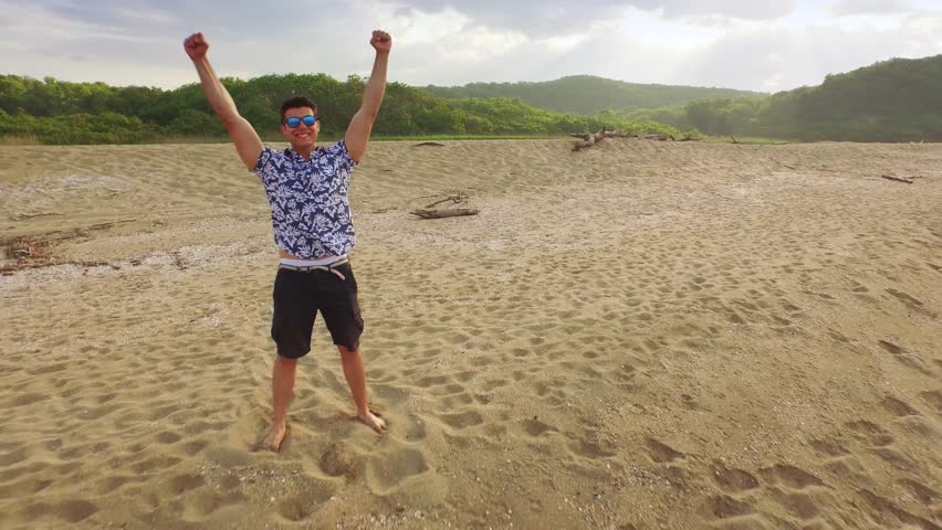 Success Arms up Beach Male Stock Footage Video (100% Royalty-free ...