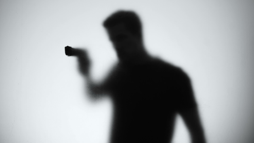 Shadow Man Gun Stock Video Footage - 4K and HD Video Clips | Shutterstock