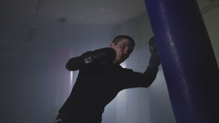 kickboxer training low light gym sportsman Stock Footage Video (100% ...