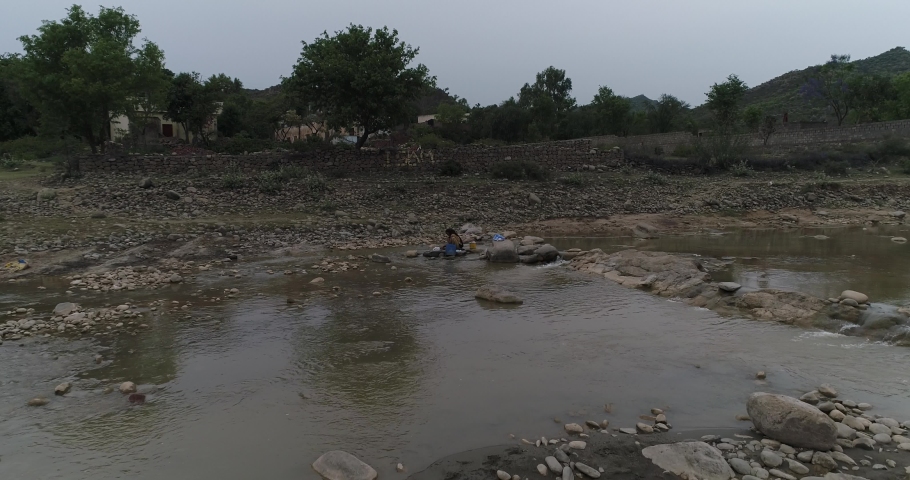 women-at-the-river-washing-clothes image - Free stock photo - Public ...