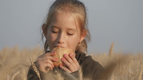 Hungry Child Eating Bread Wheat Field Stock Footage Video (100% Royalty ...