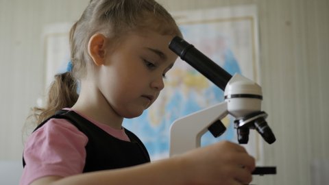 Child Looking Into Microscope Studying Biology Stock Footage Video (100 ...