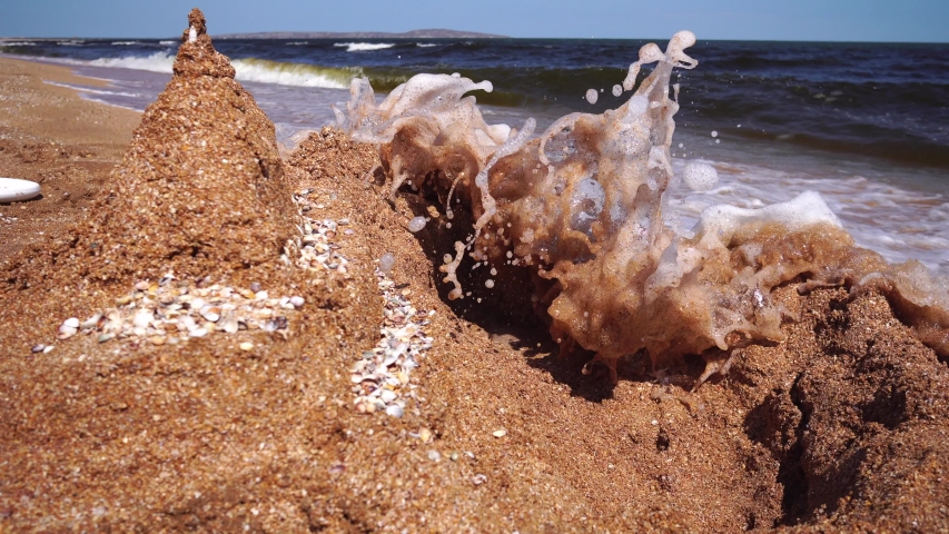 Sandcastle wave Stock Video Footage - 4K and HD Video Clips | Shutterstock