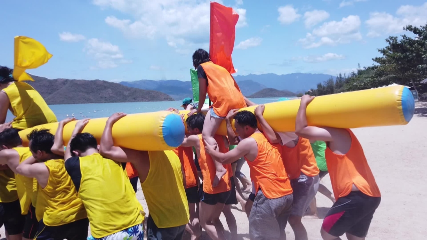 Team building activities on beach Stock Video Footage - 4K and HD Video ...