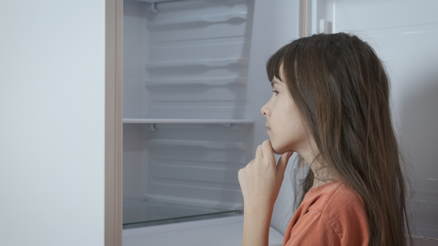 empty fridge child look disappointment she Stock Footage Video (100% ...