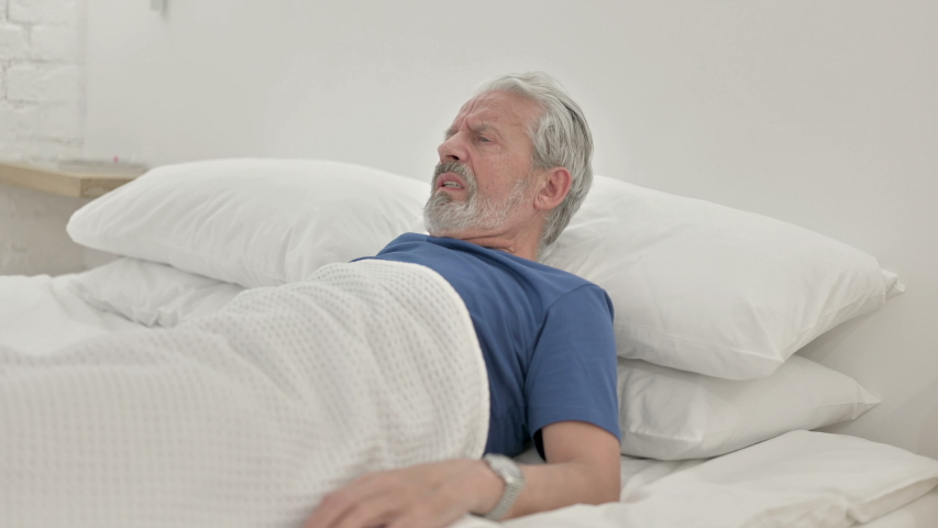 Uncomfortable Old Man Trying to Stock Footage Video (100% Royalty-free ...