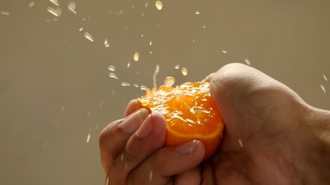 Hand squeezing fruit Stock Video Footage - 4K and HD Video Clips ...