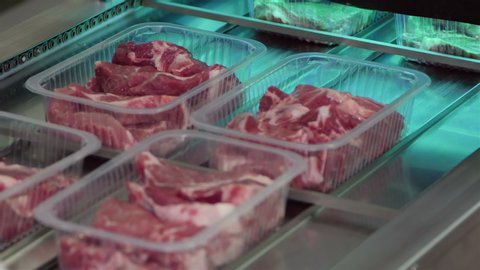 Butcher Arranging Meat Display Case Food Stock Footage Video (100% ...