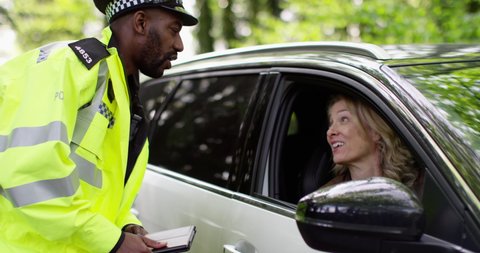 4k Friendly British Traffic Cop Talking Stock Footage Video (100% ...