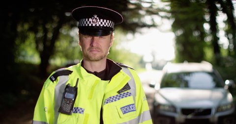 4k Portrait Serious Police Officer Standing Stock Footage Video (100% ...