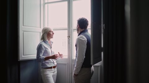 Two Business People Talking By Window Stock Footage Video (100% Royalty ...