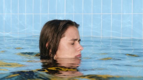Young Girl Dips Into Water Pool Stock Footage Video (100% Royalty-free ...