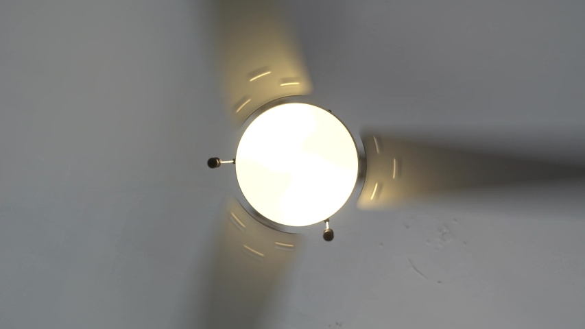 ceiling fan spinning light turned on Stock Footage Video (100% Royalty ...