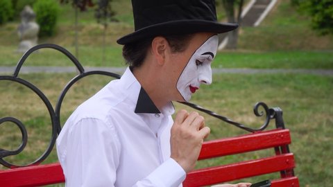 Fun Mime Sits On Park Bench Stock Footage Video (100% Royalty-free ...