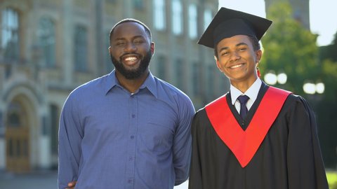 Smiling Black Father Embracing Graduating Son Stock Photo 1539525437 ...