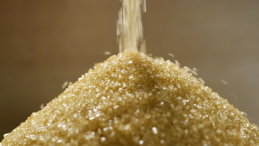 Brown Sugar Falling in Slow Stock Footage Video (100% Royalty-free ...