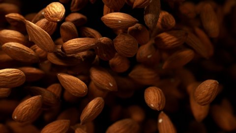 Falling Almonds On Black Background Popular Stock Photo 1594625740 ...