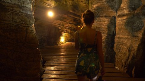 Woman Tourist Lantern Passes Inside Cave Stock Footage Video (100% ...