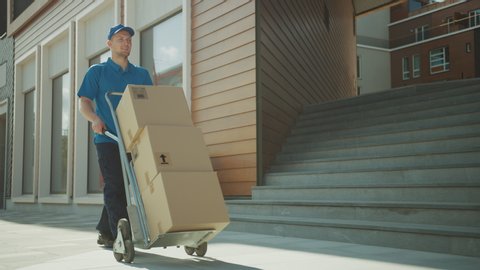 Delivery Man Uses Hand Truck Trolley Stock Footage Video (100% Royalty ...