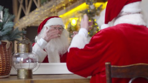 Santa Pointing Camera Tilting Glasses Down Stock Footage Video (100% ...