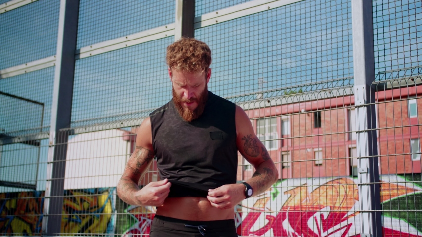 smiling man feeling exhausted perspiring after Stock Footage Video (100 ...