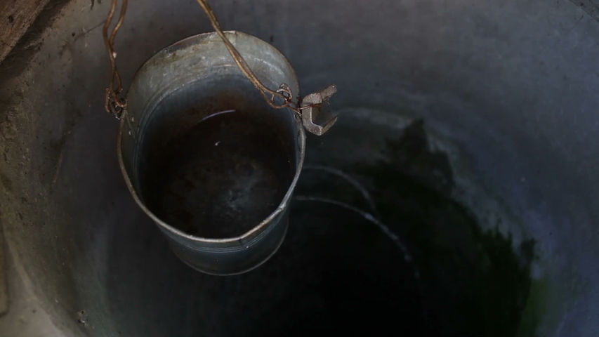 A Leaky Leaking Bucket Hangs Stock Footage Video (100% Royalty-free ...