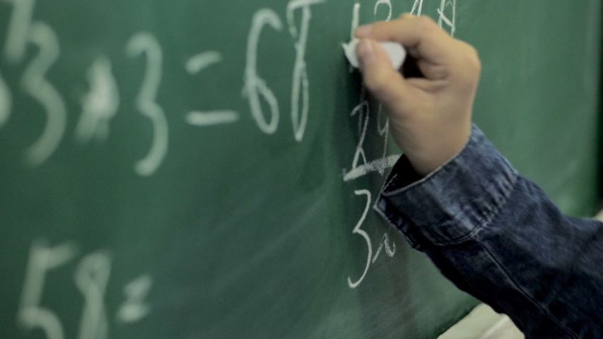 maths' chalkboard hand's writing simple mathematical Stock Footage ...