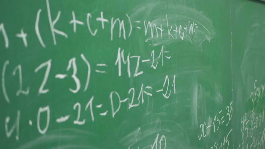 maths' chalkboard hand's writing simple mathematical Stock Footage ...
