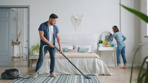 Man Woman Busy Housework Bedroom Cleaning Stock Footage Video (100% ...