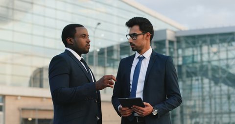 Two Men Talking Together While Standing Stock Footage Video (100% ...