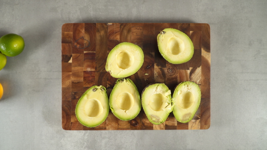 Scrape Inside of Avocado Out Stock Footage Video (100% Royalty-free ...