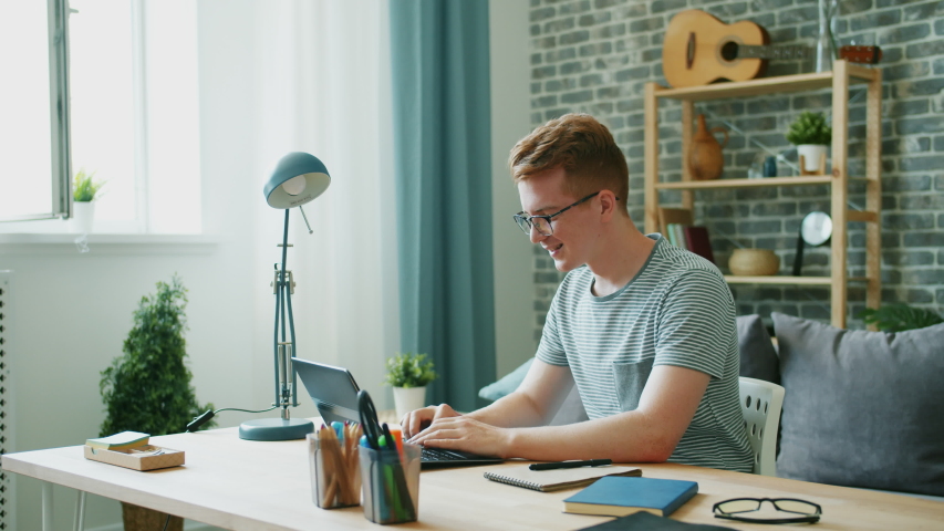 Happy Teenager is Using Laptop Stock Footage Video (100% Royalty-free ...