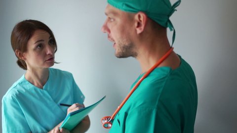 two doctors arguing hallway clinic emotional Stock Footage Video (100% ...