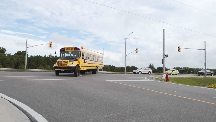 School bus turning left Stock Video Footage - 4K and HD Video Clips ...
