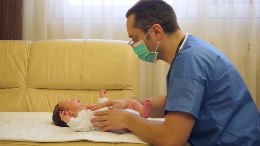 Friendly Doctor Consulting Crying Newborn Stock Footage Video (100% ...