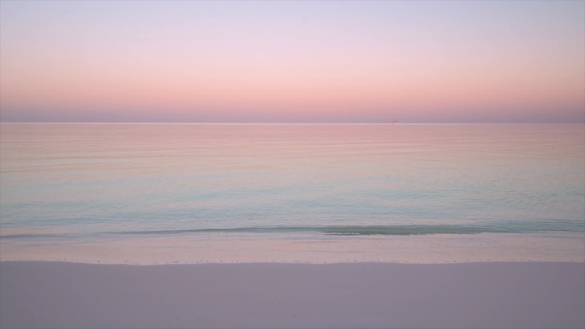calm waters beautiful pink dawn sky Stock Footage Video (100% Royalty ...