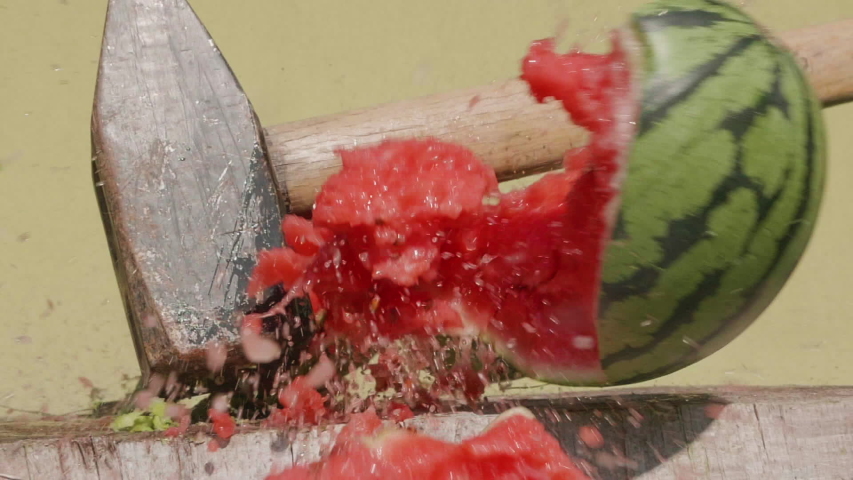 large hammer smash small watermelon - Stock Footage Video (100% Royalty ...