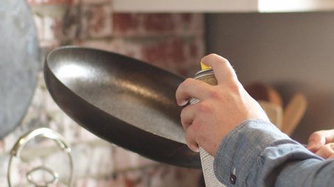 Spraying Non Stick Spray Frying Pan Stock Footage Video (100% Royalty ...