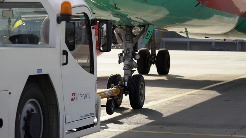 Airport pushback truck Stock Video Footage - 4K and HD Video Clips ...