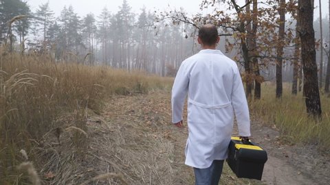 Forest Ecologist Walks Tool Box Environmental Stock Footage Video (100% ...