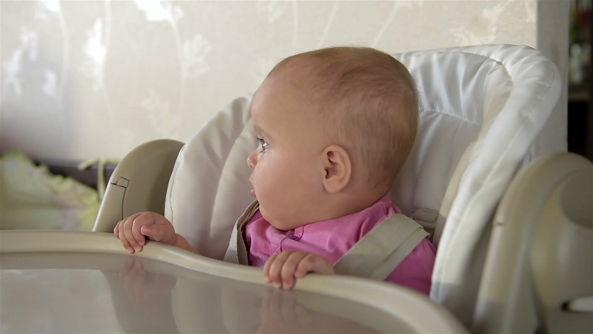 Little Cute Girl Sits Behind Stock Footage Video (100% Royalty-free ...